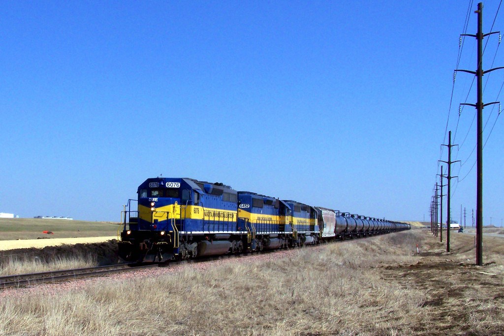 ICE 6076 leads ethanol empties westbound